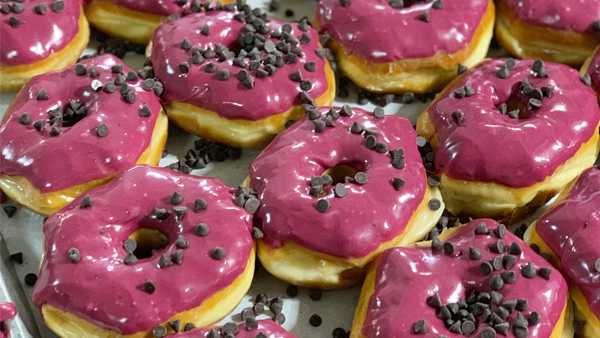 Graeter’s black raspberry chocolate chip doughnut returns