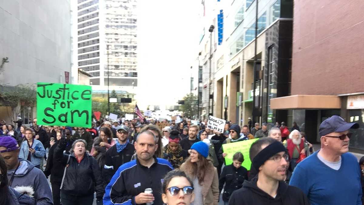 PHOTOS: Black Lives Matter, Anti-Trump rallies merge in Cincinnati