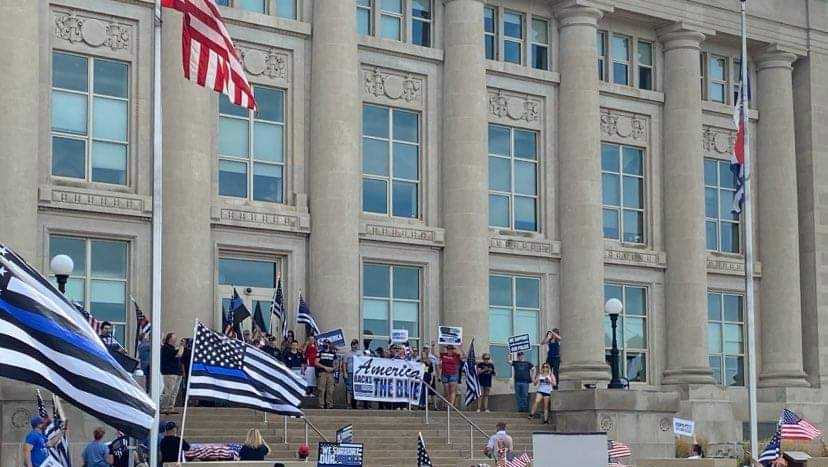 Group walks through Des Moines streets for Back the Blue March
