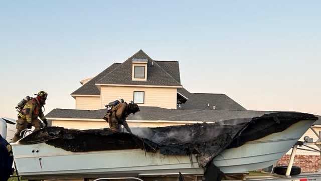 Boat catches fire on trailer at the Reservoir