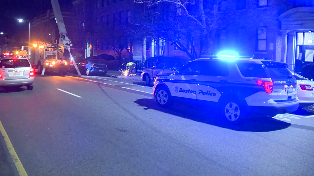 Car hits several parked vehicles, utility pole in Boston
