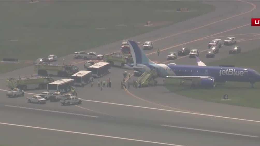 JetBlue flight rolls into grass during landing at Logan Airport