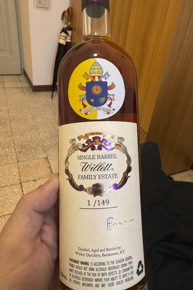 Bourbon bottles signed by the pope raise thousands for Kentucky charity