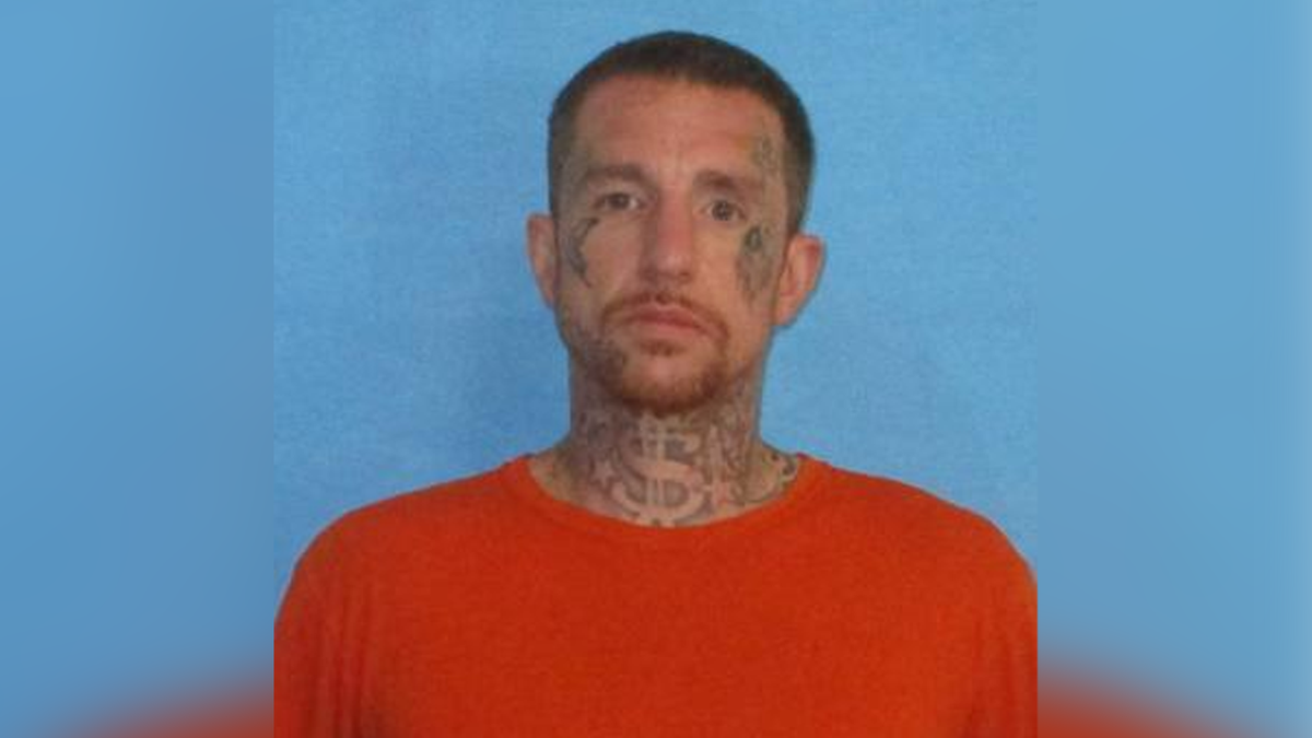 Oklahoma authorities search for escaped inmate with face tattoos