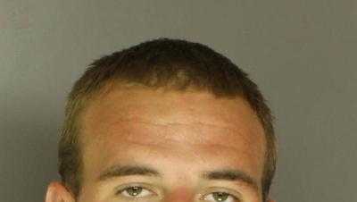 Man dancing on roof arrested, police say