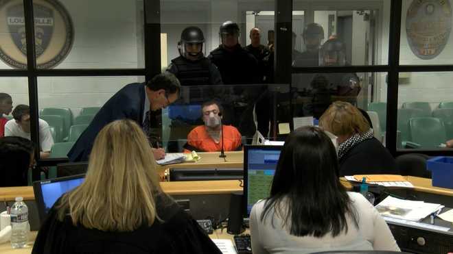 Man charged with killing 3 accused of trying to escape from jail