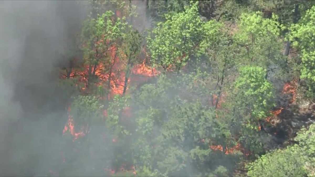 Massachusetts brush fire still burning near Lynn neighborhoods