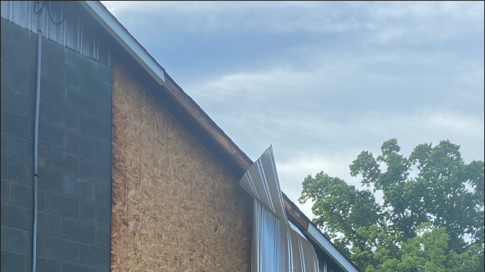 PHOTOS: damage to buildings on farm, trees after storm