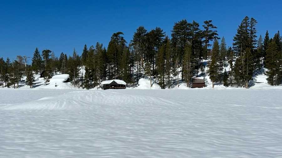 Photos show cabins engulfed by massive snow piles at Wrights Lake