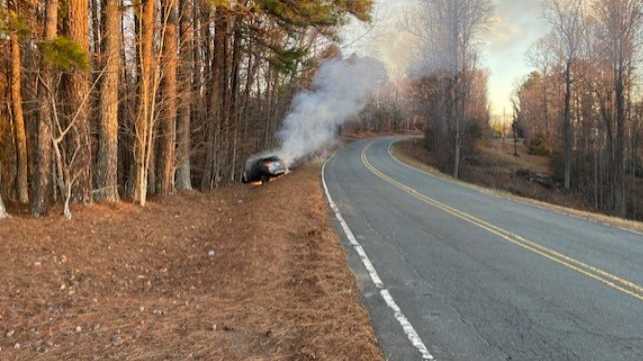 Man rescues woman from burning car in Forsyth County