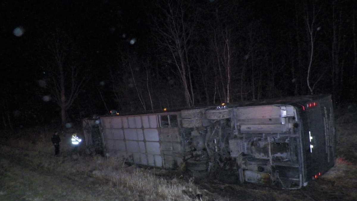 Bus carrying touring theater group crashes on I-95 in Maine
