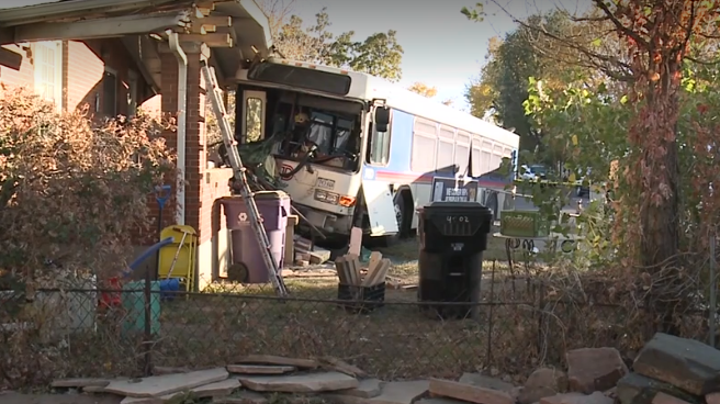 Transit bus barely misses family after slamming into home