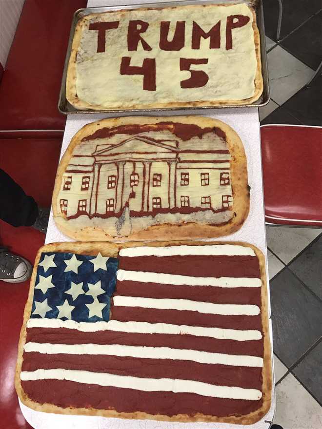Athens 'Trump Pizza' creator unveils new inaugural designs