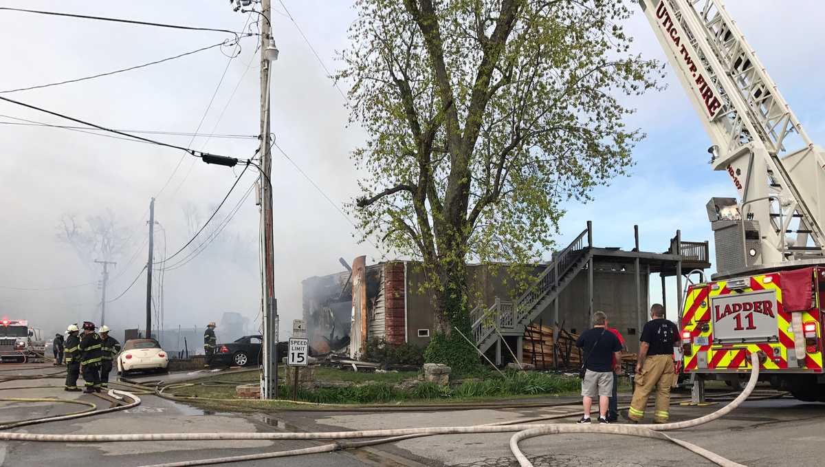 No injuries reported after 2 houses catch fire in Utica