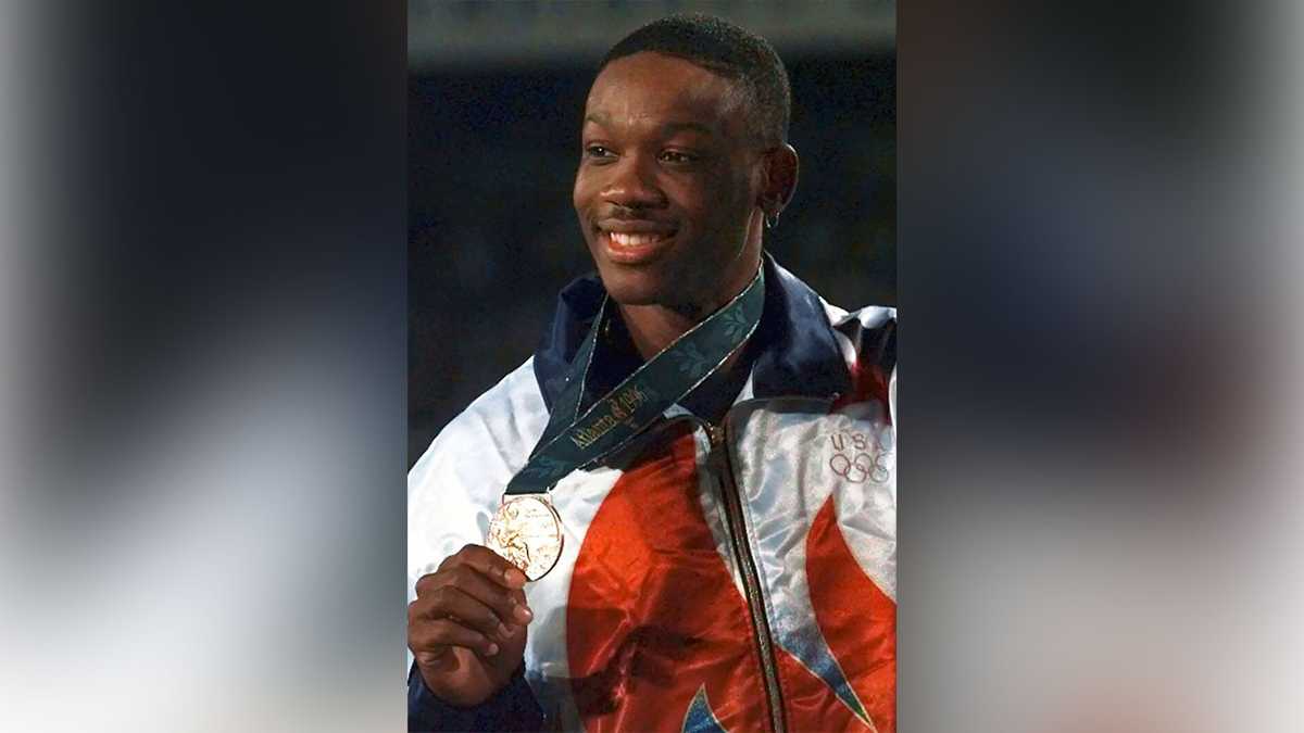 Olympic medalist Davis, former Boston track star, dies at age 51