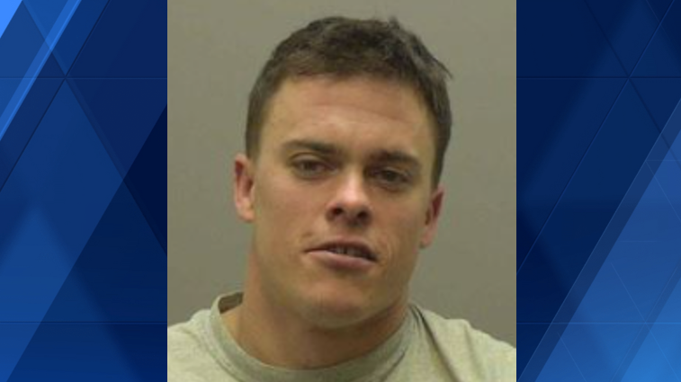 North Carolina man escaped police custody kicking out window