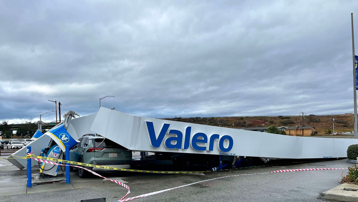 Marina gas station canopy falls and crushes 2 vehicles