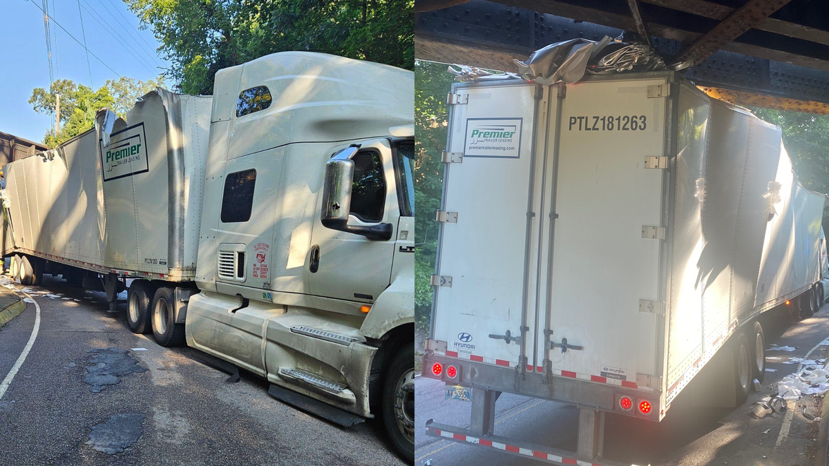 Tractor-trailer sliced open by low bridge in Canton, Mass.