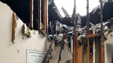 Crackling sound alerts residents to burning home