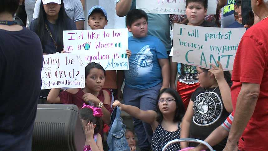 Residents in Canton rally against immigration raids