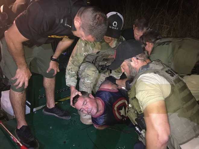 Man who jumped into alligator-infested water to escape deputies captured