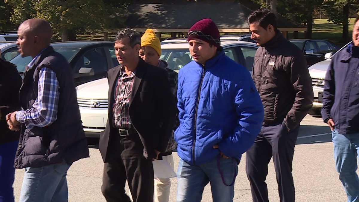 Newly naturalized citizens encourage people to vote
