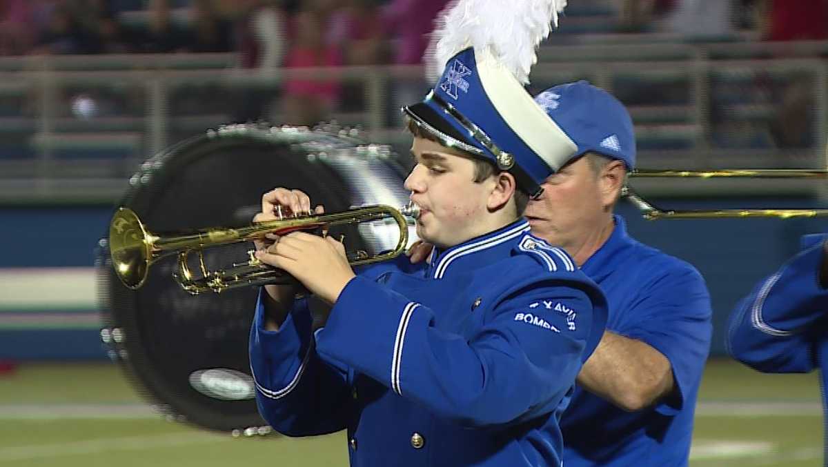 St. X marching band member overcomes obstacles with help of band of ...