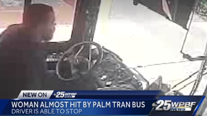 Video shows woman falling in front of bus, driver slamming on brakes