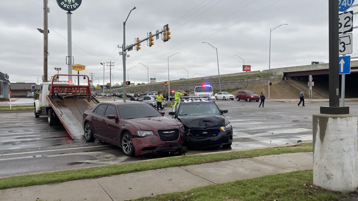 Authorities on scene of multi-vehicle crash, police car in OKC