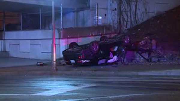 Driver loses control, flipping car off of downtown Cincinnati ...