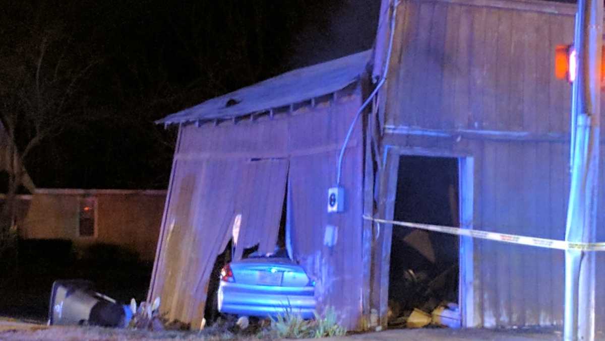 Police chase ends with car crashing into a building
