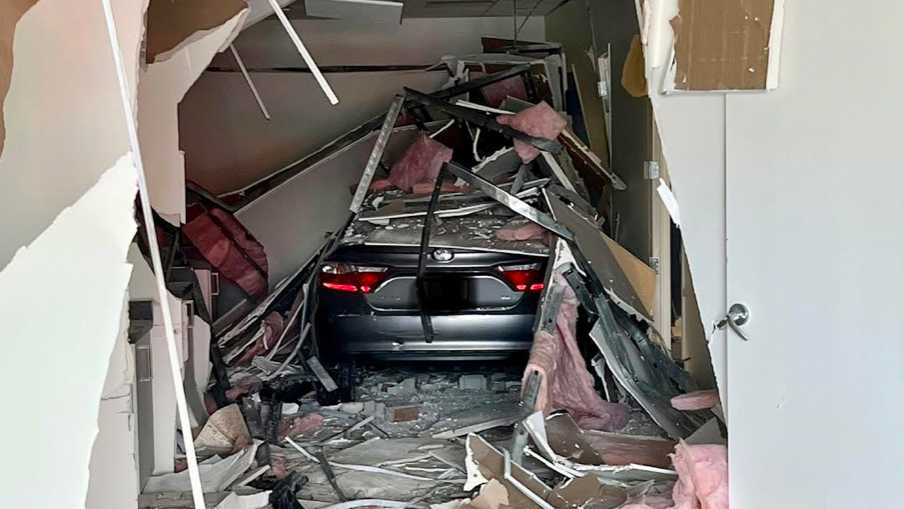 Car crashes into store at Fox Run Shopping Center