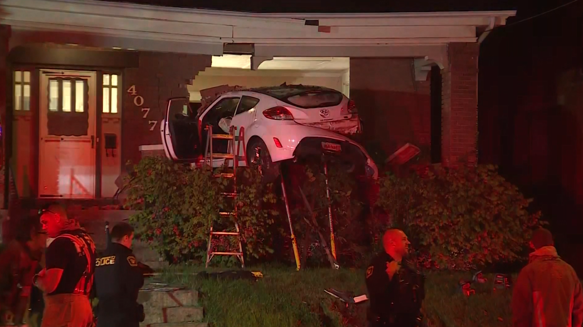 Driver arrested after car slams into West Price Hill home