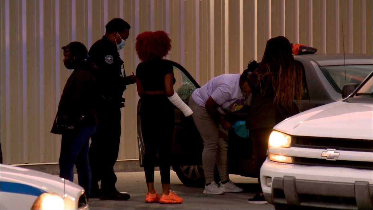 Woman inside car when windows shot out