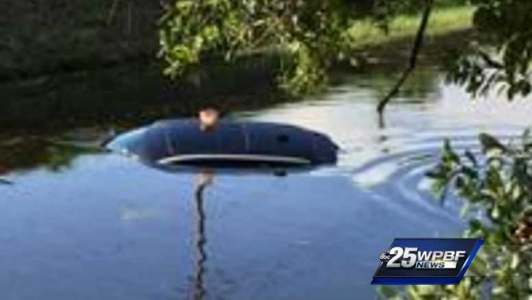 Police talk about rescuing woman from submerged vehicle in canal