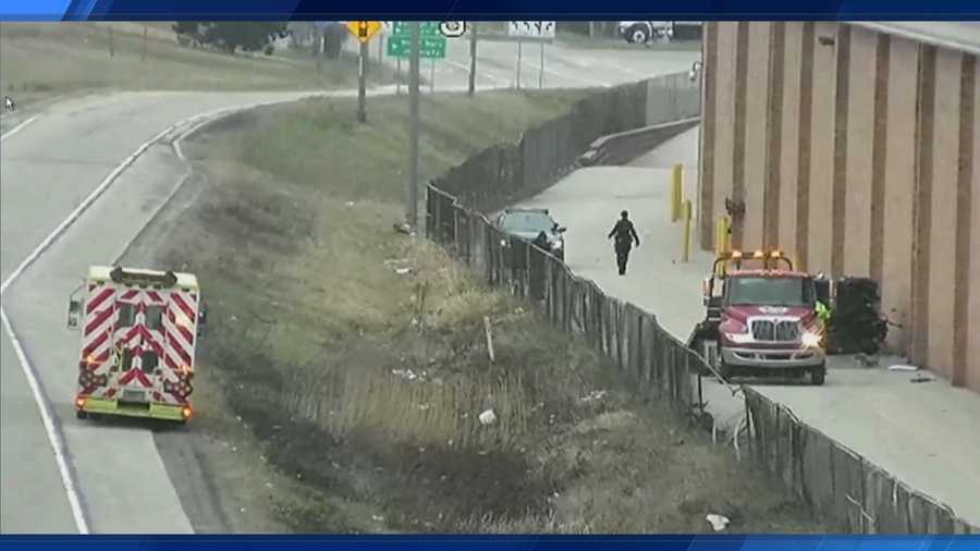 Car crashes through fence on Interstate 41/45