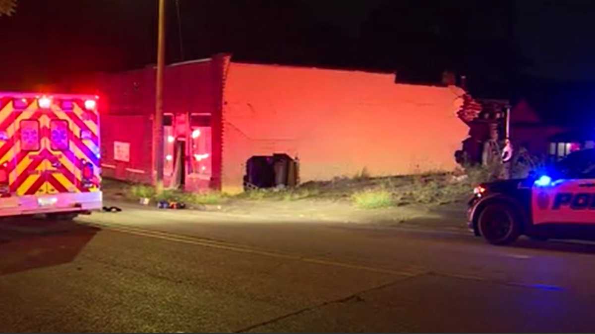 Car carrying shooting victim crashes into Birmingham building
