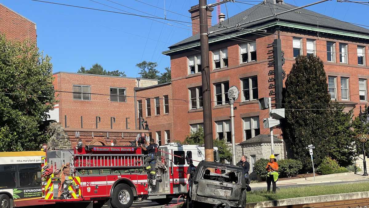 Car fire on light rail tracks injures one, closes station