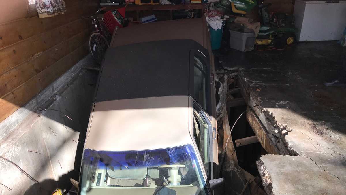 Car falls through concrete garage floor at KC home
