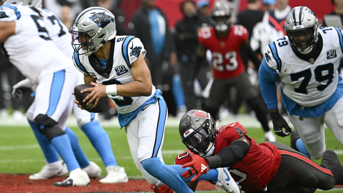 Mayfield throws 5 TD passes and Bucs keep playoff, NFC South hopes ...