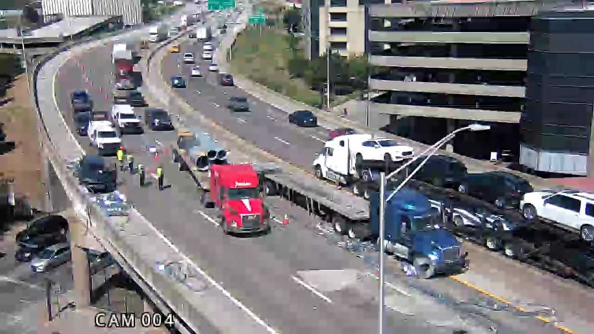 All lanes of I-65 in downtown Louisville reopen after semi loses load