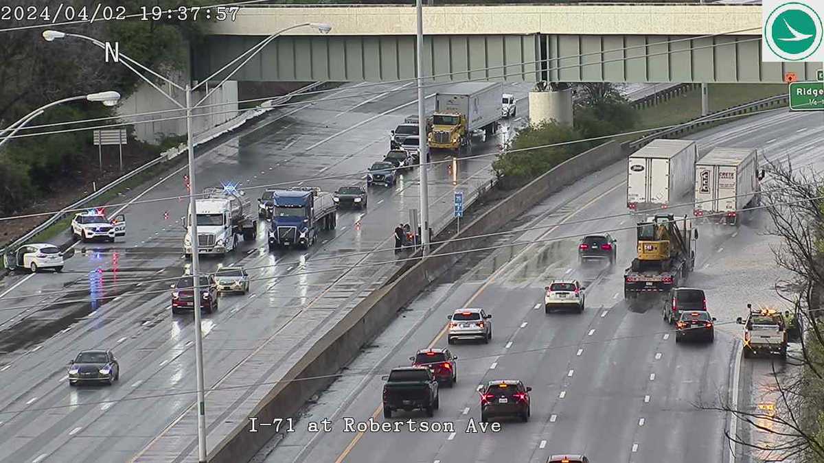 Crash partially blocking traffic, water on the road on I-71 near Oakley