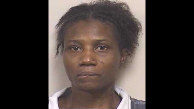 Woman charged after leading police to child's remains in bag