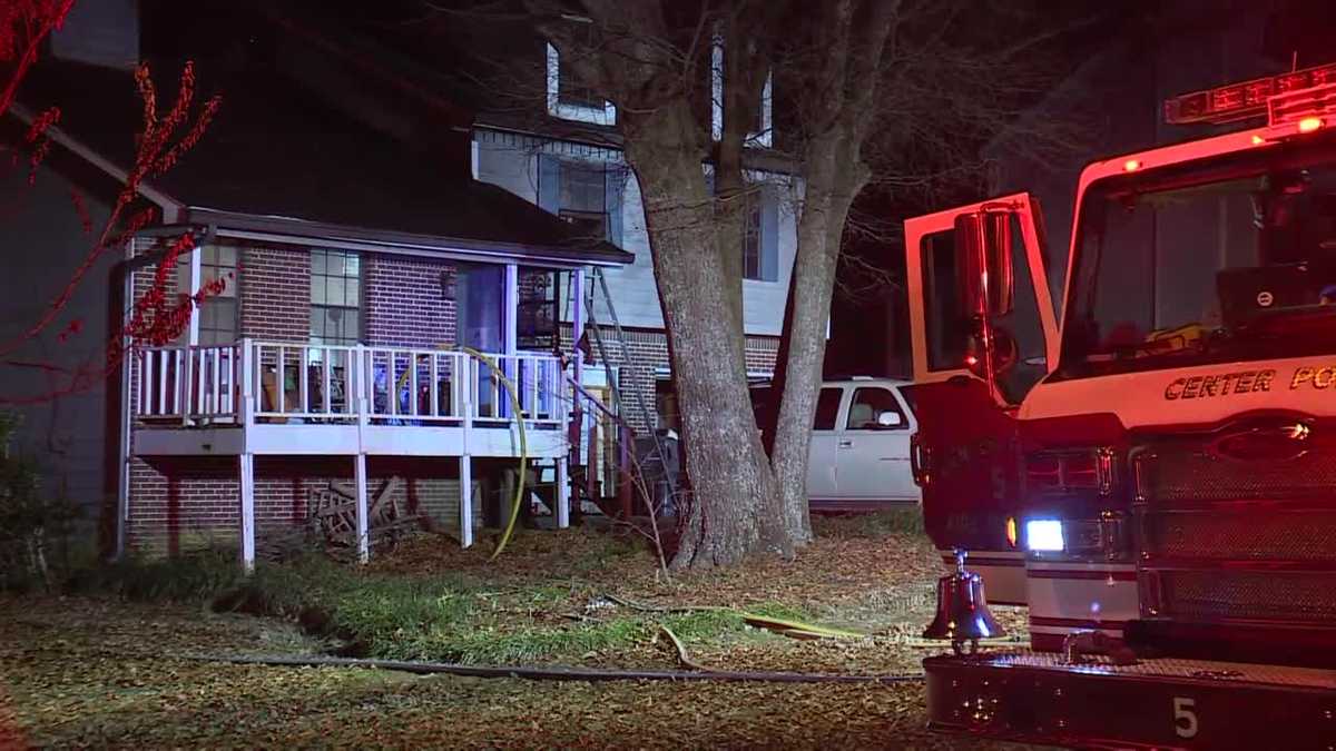 Woman injured, several dogs dead after Clay house fire