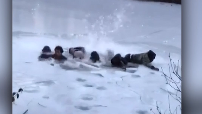 Teens fall through ice while taking pictures on frozen pond