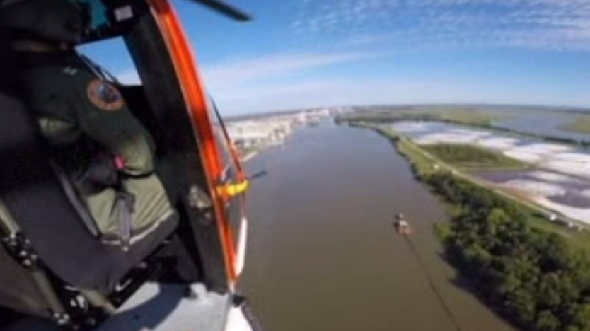 Coast Guard helicopter scans area to assess storm damage