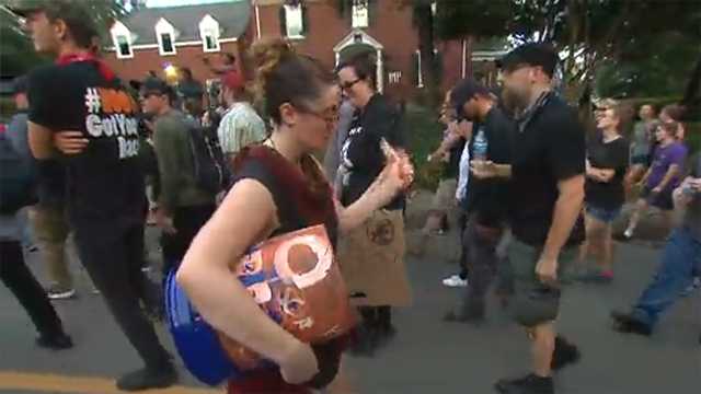 Tense confrontation occurs amid peaceful vigils in Charlottesville