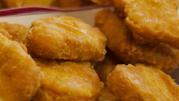 Authorities: Woman pulls gun at drive-through after chicken nugget ...