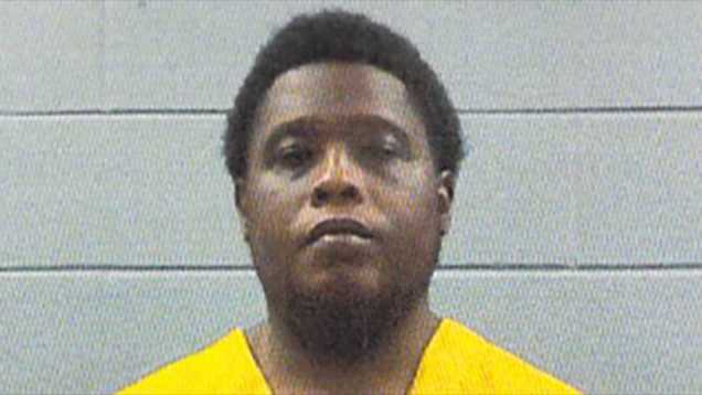 Krystal employee in custody, accused of pointing gun at co-worker