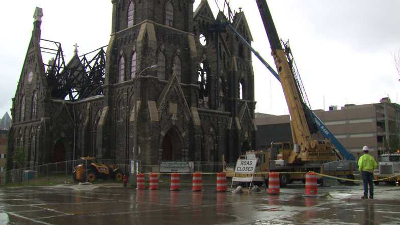 Crews stabilize walls ahead of rebuilding of fire-damaged historic church